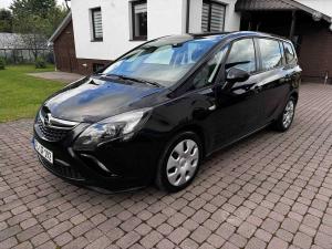 Black Opel Zafira Tourer 2015 in Gargzdai, with an engine capacity of 1.96 L and mileage of 239 thousand km for 5799 €, photo  on AUTOMOTO.COM.LV