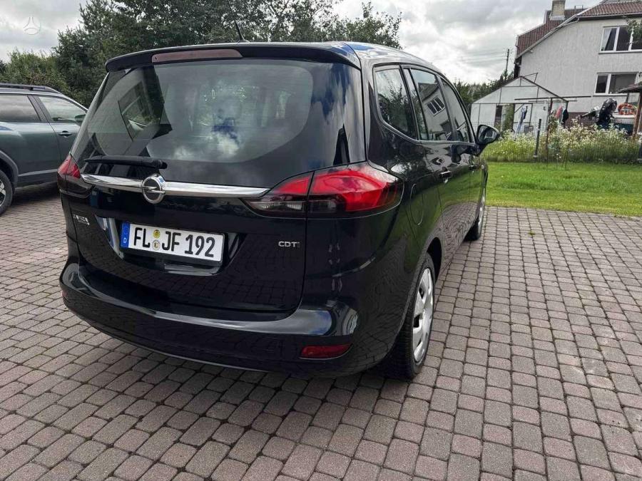 Black Opel Zafira Tourer 2015 in Gargzdai, with an engine capacity of 1.96 L and mileage of 239 thousand km for 5799 €, photo 7 on AUTOMOTO.COM.LV