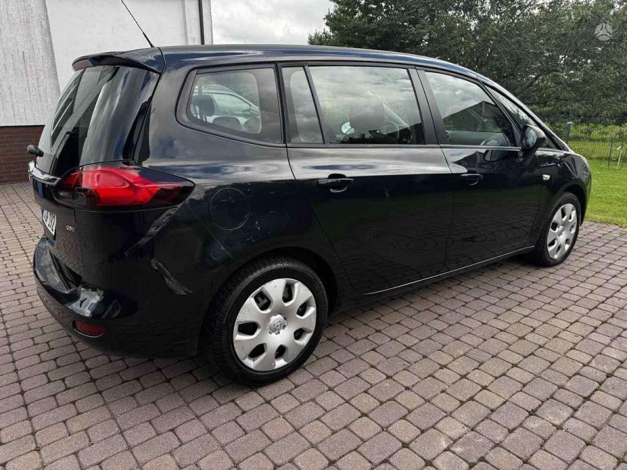Black Opel Zafira Tourer 2015 in Gargzdai, with an engine capacity of 1.96 L and mileage of 239 thousand km for 5799 €, photo 8 on AUTOMOTO.COM.LV
