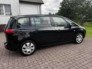 Black Opel Zafira Tourer 2015 in Gargzdai, with an engine capacity of 1.96 L and mileage of 239 thousand km for 5799 €, photo 9 on AUTOMOTO.COM.LV