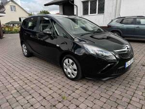 Black Opel Zafira Tourer 2015 in Gargzdai, with an engine capacity of 1.96 L and mileage of 239 thousand km for 5799 €, photo 11 on AUTOMOTO.COM.LV