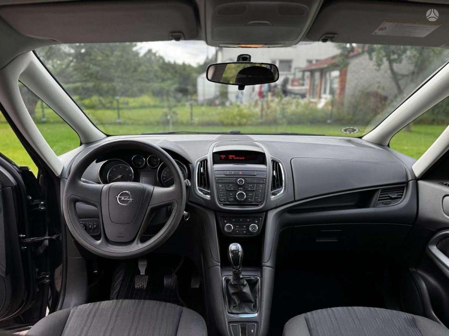 Black Opel Zafira Tourer 2015 in Gargzdai, with an engine capacity of 1.96 L and mileage of 239 thousand km for 5799 €, photo 15 on AUTOMOTO.COM.LV