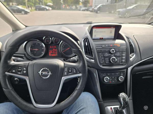 Black Opel Zafira Tourer 2015 in Vilnius, with an engine capacity of 1.96 L and mileage of 256 thousand km for 5750 €, photo 7 on AUTOMOTO.COM.LV