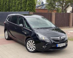 Black Opel Zafira Tourer 2016 in Marijampole, with an engine capacity of 1.96 L and mileage of 272 thousand km for 7250 €, photo 3 on AUTOMOTO.COM.LV