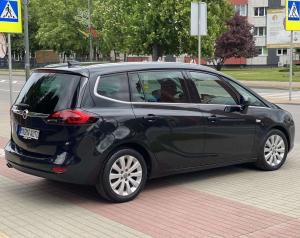 Black Opel Zafira Tourer 2016 in Marijampole, with an engine capacity of 1.96 L and mileage of 272 thousand km for 7250 €, photo 6 on AUTOMOTO.COM.LV
