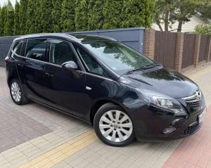 Black Opel Zafira Tourer 2016 in Marijampole, with an engine capacity of 1.96 L and mileage of 272 thousand km for 7250 €, photo 11 on AUTOMOTO.COM.LV