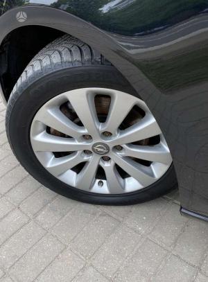 Black Opel Zafira Tourer 2016 in Marijampole, with an engine capacity of 1.96 L and mileage of 272 thousand km for 7250 €, photo 13 on AUTOMOTO.COM.LV
