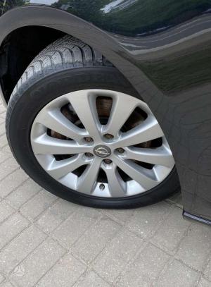 Black Opel Zafira Tourer 2016 in Marijampole, with an engine capacity of 1.96 L and mileage of 272 thousand km for 7250 €, photo 13 on AUTOMOTO.COM.LV
