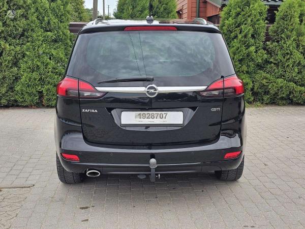 Black Opel Zafira Tourer 2017 in Kretinga, with an engine capacity of 1.96 L and mileage of 304 thousand km for 7999 €, photo 10 on AUTOMOTO.COM.LV