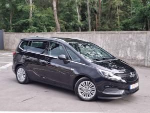 Black Opel Zafira Tourer 2018 in Vilnius, with an engine capacity of 1.96 L and mileage of 136 thousand km for 8300 €, photo  on AUTOMOTO.COM.LV