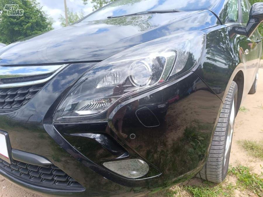 Black Opel Zafira Tourer 2012 in Utena, with an engine capacity of 2.00 L and mileage of 335 thousand km for 4500 €, photo 3 on AUTOMOTO.COM.LV