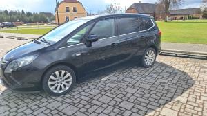 Black Opel Zafira Tourer 2013 in Kelme, with an engine capacity of 1.40 L and mileage of 123 thousand km for 4800 €, photo  on AUTOMOTO.COM.LV