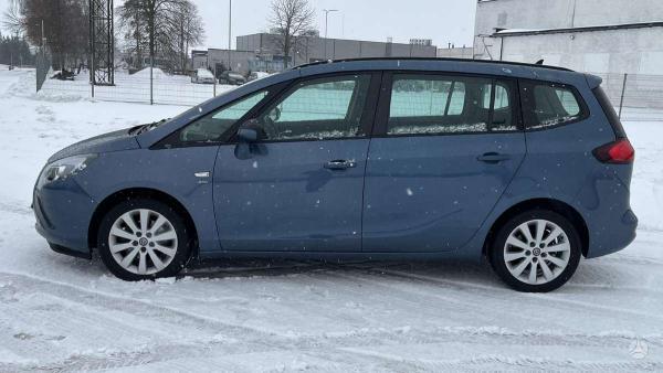 Zils Opel Zafira Tourer 2013 Marijampole, ar dzinēja tilpumu 1.96 L un nobraukumu 263 tūkst. km par 4300 €, foto 4 vietnē AUTOMOTO.COM.LV