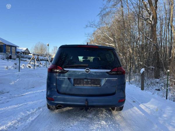 Blue Opel Zafira Tourer 2014 in Utena, with an engine capacity of 1.60 L and mileage of 144 thousand km for 5400 €, photo 6 on AUTOMOTO.COM.LV