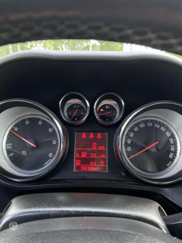 Blue Opel Zafira Tourer 2014 in Panevezys, with an engine capacity of 1.60 L and mileage of 285 thousand km for 4650 €, photo 9 on AUTOMOTO.COM.LV