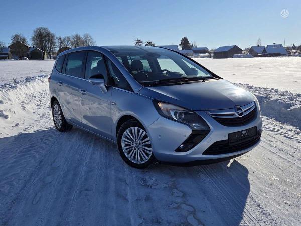 Blue Opel Zafira Tourer 2015 in Kaunas, with an engine capacity of 1.60 L and mileage of 256 thousand km for 5989 €, photo 1 on AUTOMOTO.COM.LV
