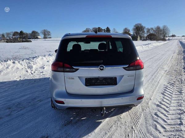 Blue Opel Zafira Tourer 2015 in Kaunas, with an engine capacity of 1.60 L and mileage of 256 thousand km for 5989 €, photo 4 on AUTOMOTO.COM.LV