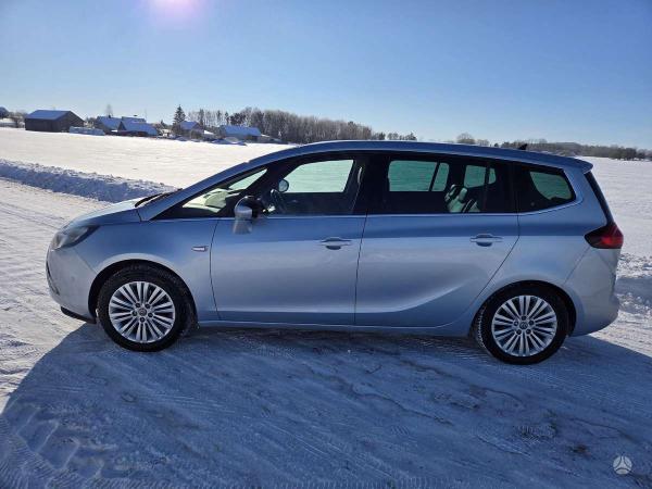 Blue Opel Zafira Tourer 2015 in Kaunas, with an engine capacity of 1.60 L and mileage of 256 thousand km for 5989 €, photo 6 on AUTOMOTO.COM.LV