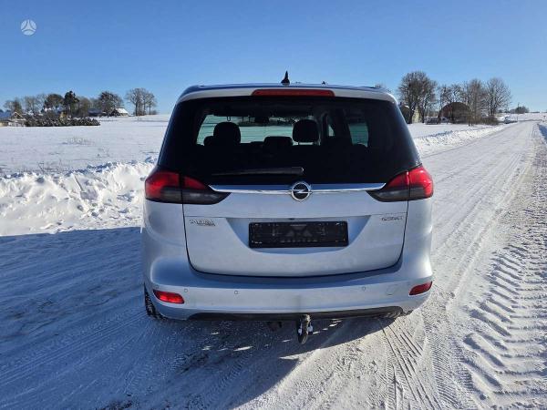 Blue Opel Zafira Tourer 2015 in Kaunas, with an engine capacity of 1.60 L and mileage of 256 thousand km for 5650 €, photo 4 on AUTOMOTO.COM.LV