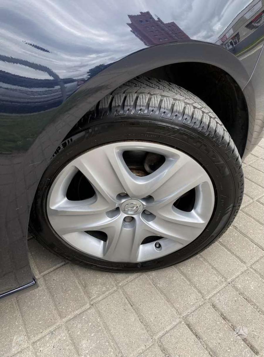 Blue Opel Zafira Tourer 2019 in Marijampole, with an engine capacity of 1.96 L and mileage of 223 thousand km for 8450 €, photo 11 on AUTOMOTO.COM.LV