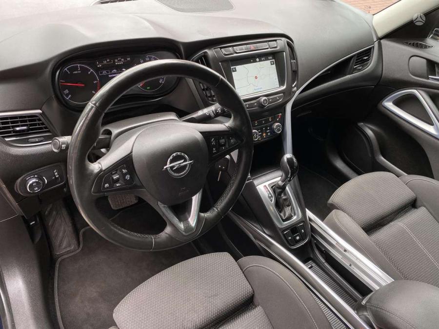 Blue Opel Zafira Tourer 2019 in Marijampole, with an engine capacity of 1.96 L and mileage of 223 thousand km for 8450 €, photo 21 on AUTOMOTO.COM.LV