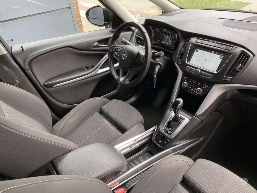 Blue Opel Zafira Tourer 2019 in Marijampole, with an engine capacity of 1.96 L and mileage of 223 thousand km for 8450 €, photo 31 on AUTOMOTO.COM.LV