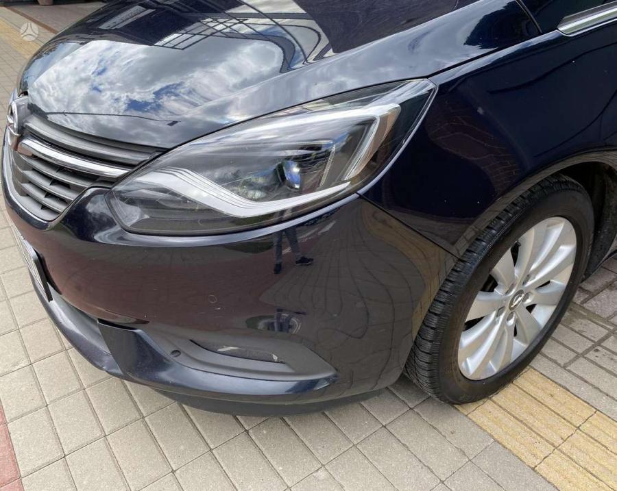 Blue Opel Zafira Tourer 2019 in Marijampole, with an engine capacity of 1.96 L and mileage of 249 thousand km for 8350 €, photo 11 on AUTOMOTO.COM.LV
