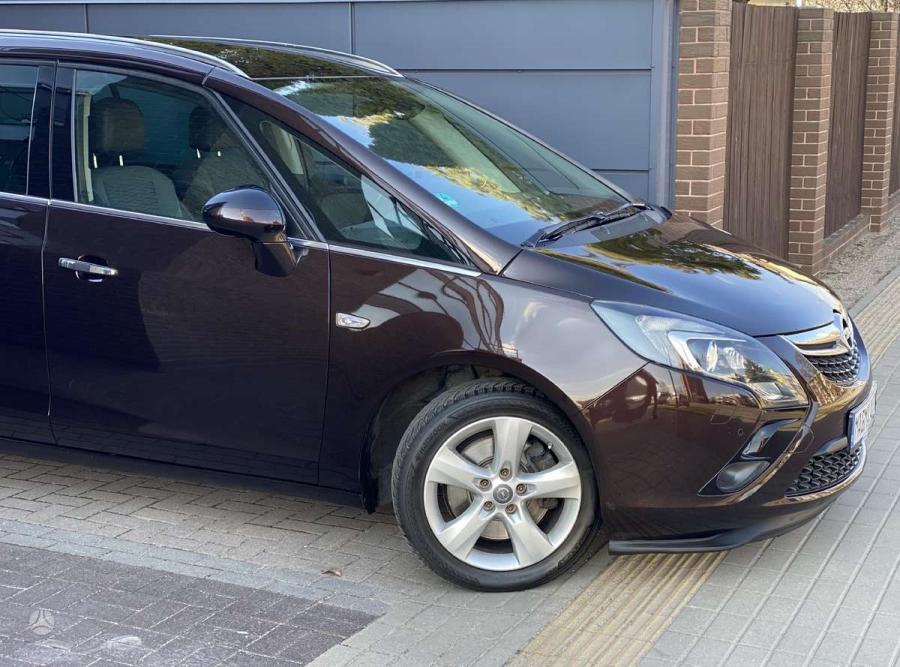 Brown Opel Zafira Tourer 2012 in Marijampole, with an engine capacity of 1.96 L and mileage of 239 thousand km for 6950 €, photo 7 on AUTOMOTO.COM.LV