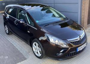 Brown Opel Zafira Tourer 2012 in Marijampole, with an engine capacity of 1.96 L and mileage of 239 thousand km for 6950 €, photo 6 on AUTOMOTO.COM.LV