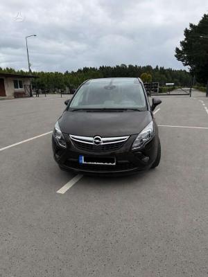 Brown Opel Zafira Tourer 2012 in Taurage, with an engine capacity of 1.96 L and mileage of 268 thousand km for 5850 €, photo 12 on AUTOMOTO.COM.LV