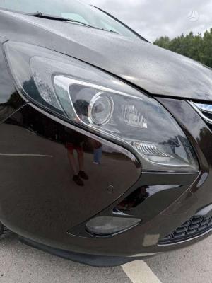 Brown Opel Zafira Tourer 2012 in Taurage, with an engine capacity of 1.96 L and mileage of 268 thousand km for 5850 €, photo 15 on AUTOMOTO.COM.LV