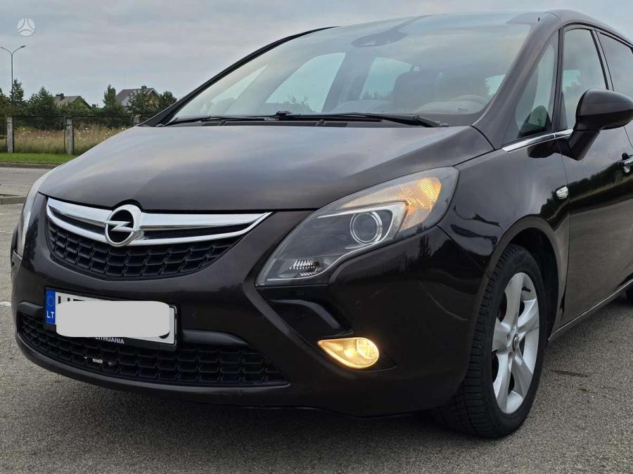 Brown Opel Zafira Tourer 2012 in Siauliai, with an engine capacity of 1.96 L and mileage of 320 thousand km for 4250 €, photo 16 on AUTOMOTO.COM.LV