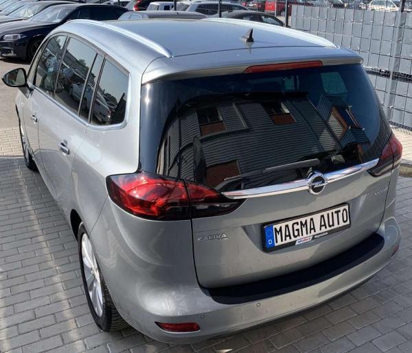 Grey Opel Zafira Tourer 2012 in Marijampole, with an engine capacity of 1.96 L and mileage of 258 thousand km for 6350 €, photo 11 on AUTOMOTO.COM.LV