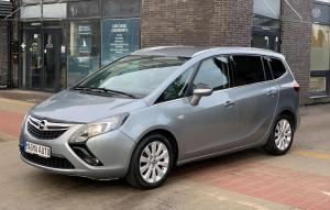 Grey Opel Zafira Tourer 2012 in Marijampole, with an engine capacity of 1.96 L and mileage of 258 thousand km for 5250 €, photo  on AUTOMOTO.COM.LV