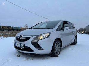 Grey Opel Zafira Tourer 2013 in Panevezys, with an engine capacity of 1.96 L and mileage of 289 thousand km for 6420 €, photo 2 on AUTOMOTO.COM.LV