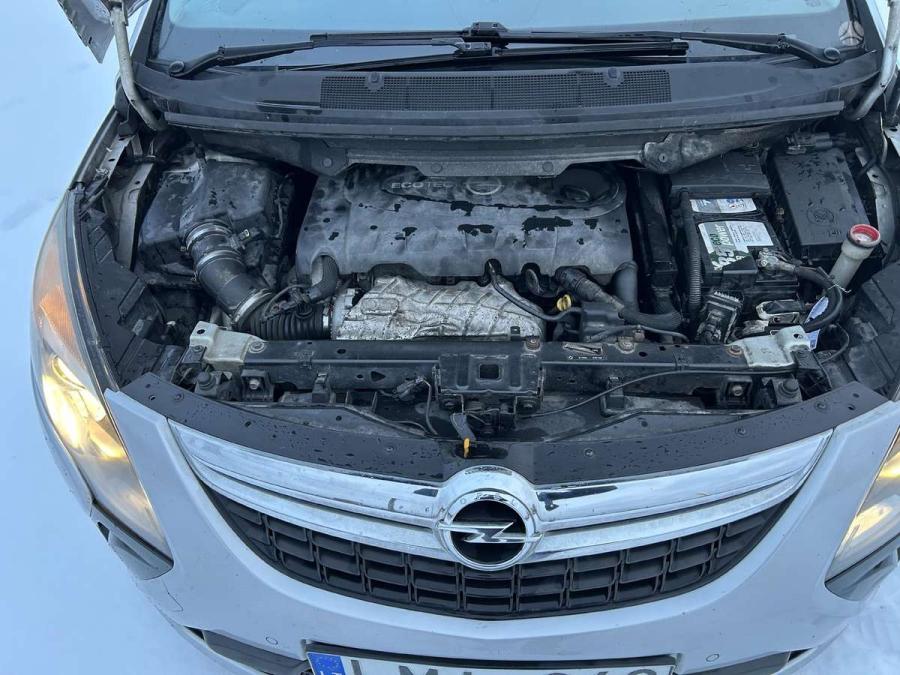 Grey Opel Zafira Tourer 2013 in Panevezys, with an engine capacity of 1.96 L and mileage of 289 thousand km for 6420 €, photo 15 on AUTOMOTO.COM.LV