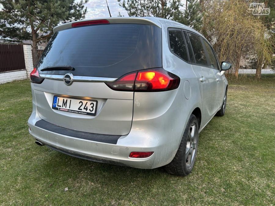 Grey Opel Zafira Tourer 2013 in Panevezys, with an engine capacity of 2.00 L and mileage of 288 thousand km for 4850 €, photo 6 on AUTOMOTO.COM.LV