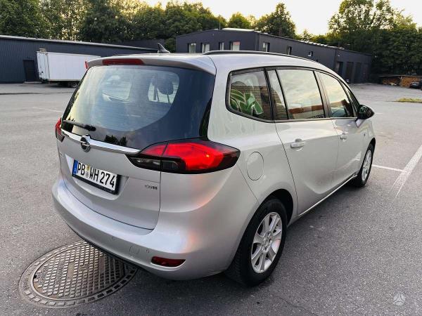 Pelēks Opel Zafira Tourer 2013 Viļņa, ar dzinēja tilpumu 1.96 L un nobraukumu 291 tūkst. km par 4600 €, foto 8 vietnē AUTOMOTO.COM.LV