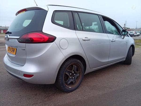 Grey Opel Zafira Tourer 2014 in Kaunas, with an engine capacity of 1.96 L and mileage of 174 thousand km for 2250 €, photo 6 on AUTOMOTO.COM.LV