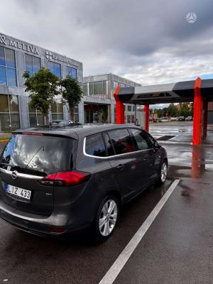 Grey Opel Zafira Tourer 2014 in Siauliai, with an engine capacity of 1.96 L and mileage of 310 thousand km for 5950 €, photo 7 on AUTOMOTO.COM.LV