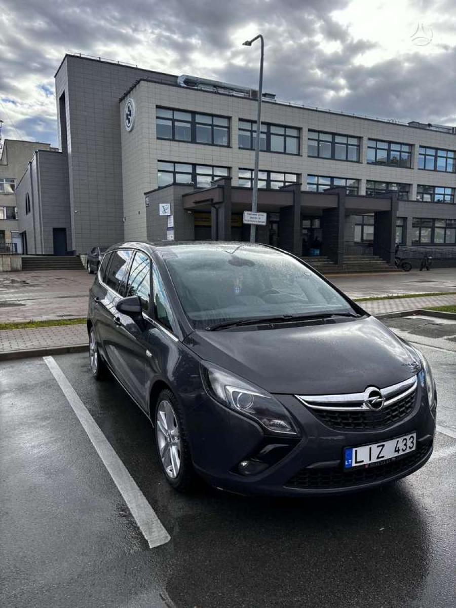 Grey Opel Zafira Tourer 2014 in Siauliai, with an engine capacity of 1.96 L and mileage of 310 thousand km for 5950 €, photo 16 on AUTOMOTO.COM.LV