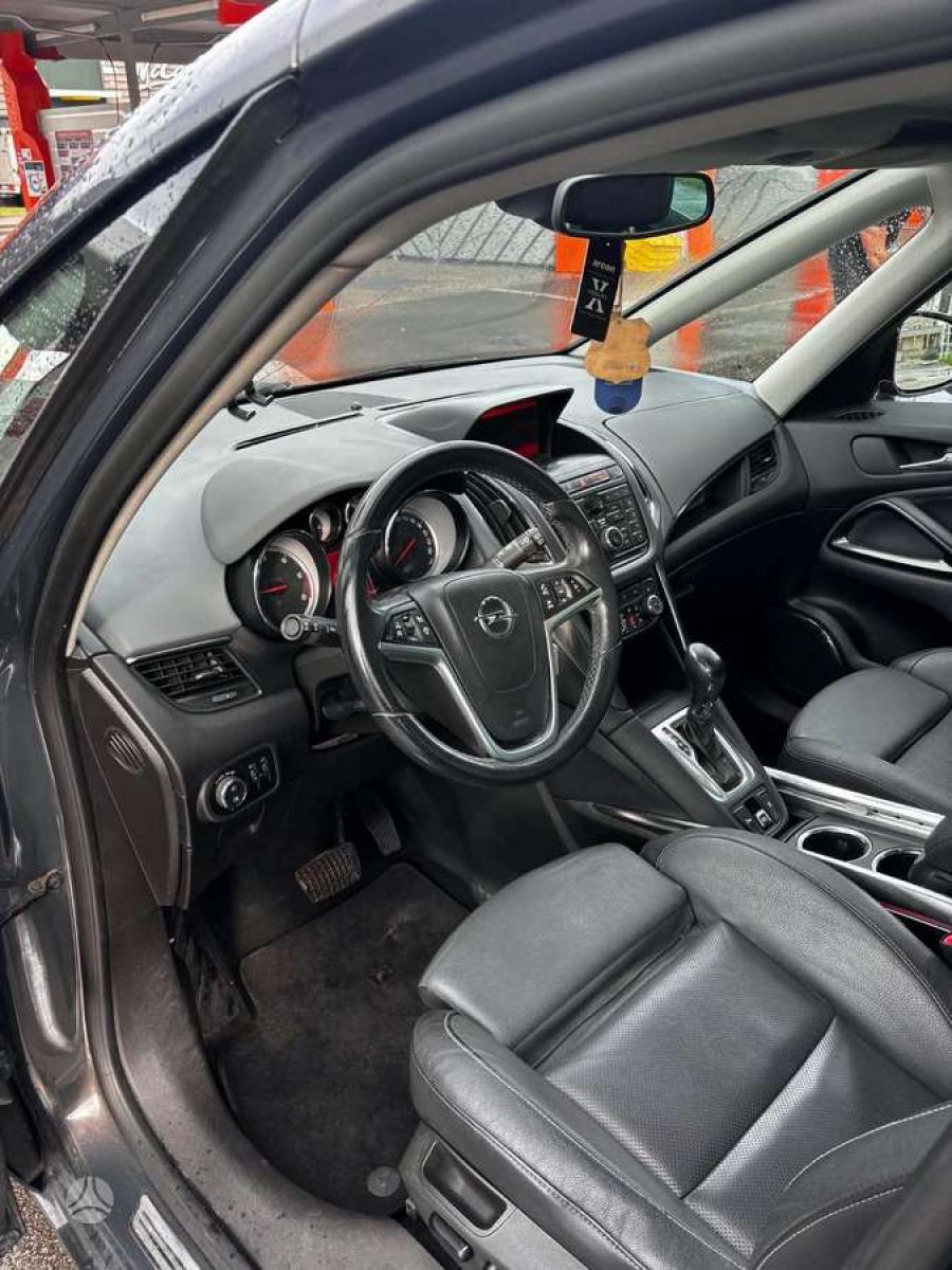 Grey Opel Zafira Tourer 2014 in Siauliai, with an engine capacity of 1.96 L and mileage of 310 thousand km for 5950 €, photo 17 on AUTOMOTO.COM.LV