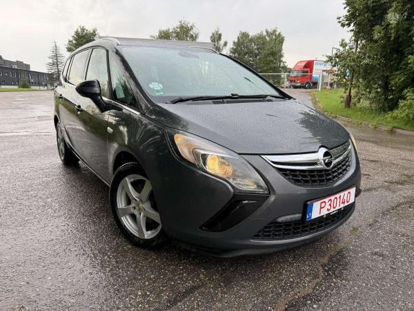 Grey Opel Zafira Tourer 2014 in Ukmerge, with an engine capacity of 1.60 L and mileage of 290 thousand km for 4500 €, photo 9 on AUTOMOTO.COM.LV