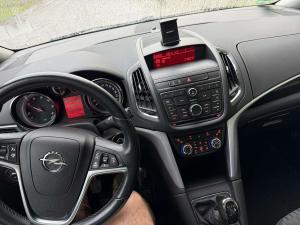 Grey Opel Zafira Tourer 2014 in Ukmerge, with an engine capacity of 1.60 L and mileage of 290 thousand km for 4500 €, photo 12 on AUTOMOTO.COM.LV