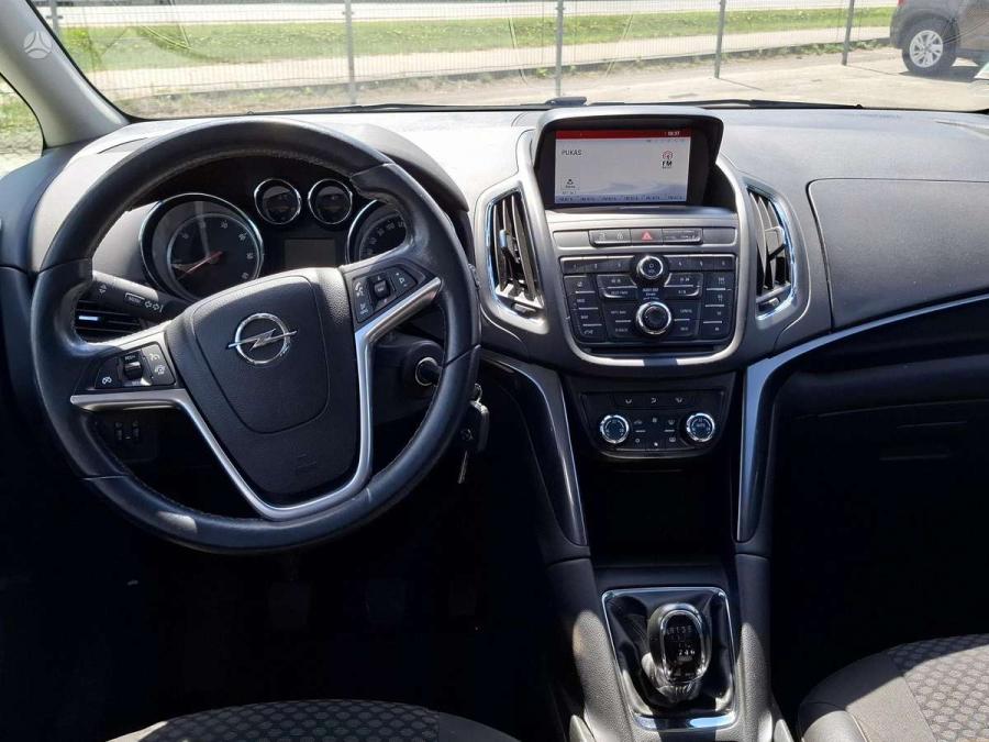 Grey Opel Zafira Tourer 2015 in Taurage, with an engine capacity of 1.60 L and mileage of 223 thousand km for 5400 €, photo 13 on AUTOMOTO.COM.LV