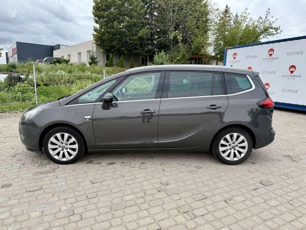 Grey Opel Zafira Tourer 2015 in Taurage, with an engine capacity of 2.00 L and mileage of 290 thousand km for 5200 €, photo 2 on AUTOMOTO.COM.LV