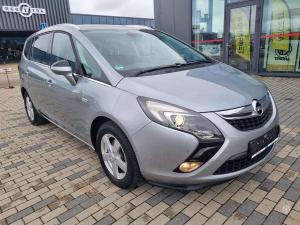 Grey Opel Zafira Tourer 2015 in Siauliai, with an engine capacity of 1.96 L and mileage of 250 thousand km for 5900 €, photo  on AUTOMOTO.COM.LV