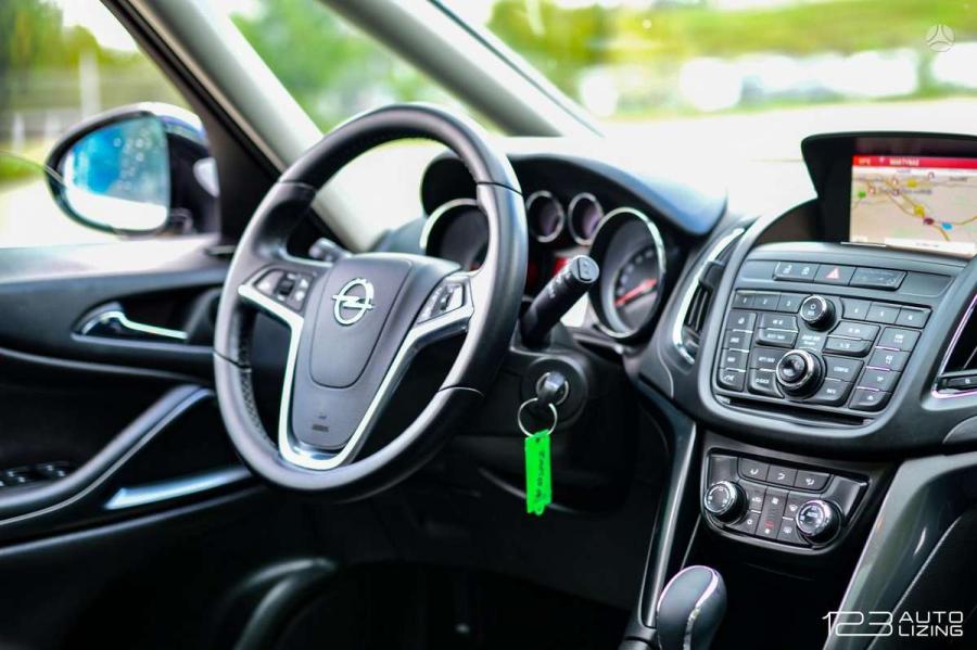 Grey Opel Zafira Tourer 2016 in Kretinga, with an engine capacity of 2.00 L and mileage of 237 thousand km for 7950 €, photo 16 on AUTOMOTO.COM.LV
