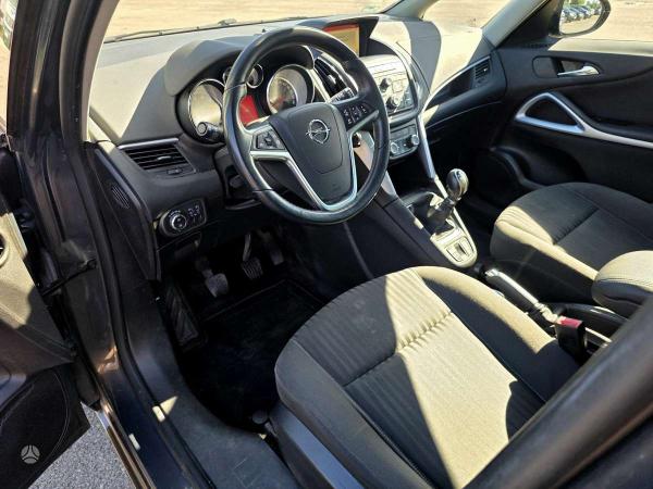 Grey Opel Zafira Tourer 2016 in Marijampole, with an engine capacity of 1.36 L and mileage of 230 thousand km for 5350 €, photo 9 on AUTOMOTO.COM.LV