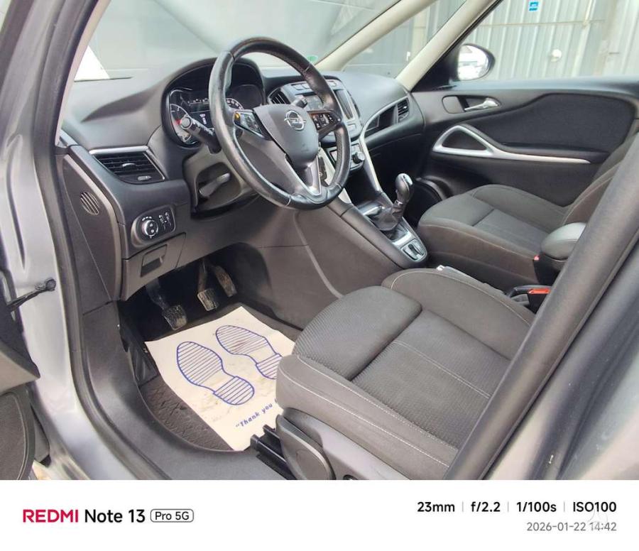 Grey Opel Zafira Tourer 2018 in Kaunas, with an engine capacity of 1.40 L and mileage of 212 thousand km for 7950 €, photo 17 on AUTOMOTO.COM.LV